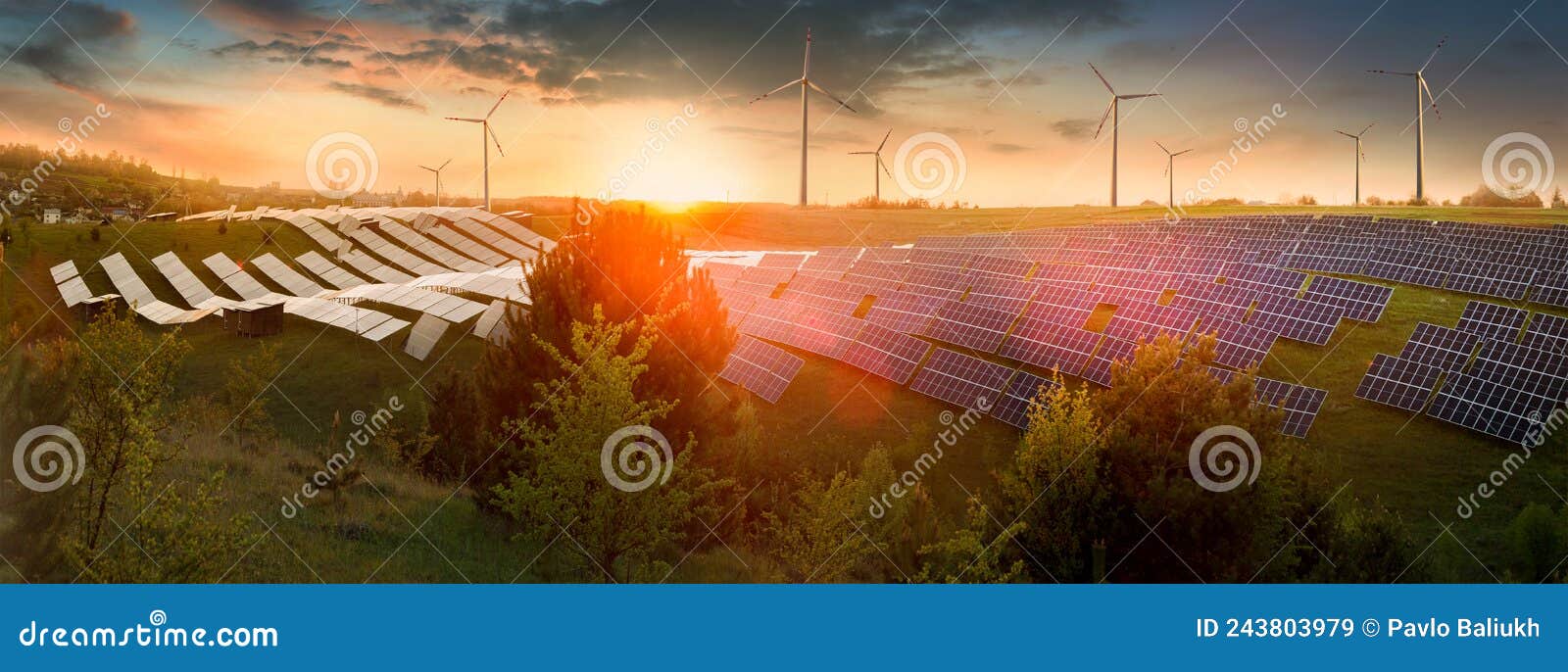 Solar Panels and Wind Generators at Sunset, Glare and Reflections ...