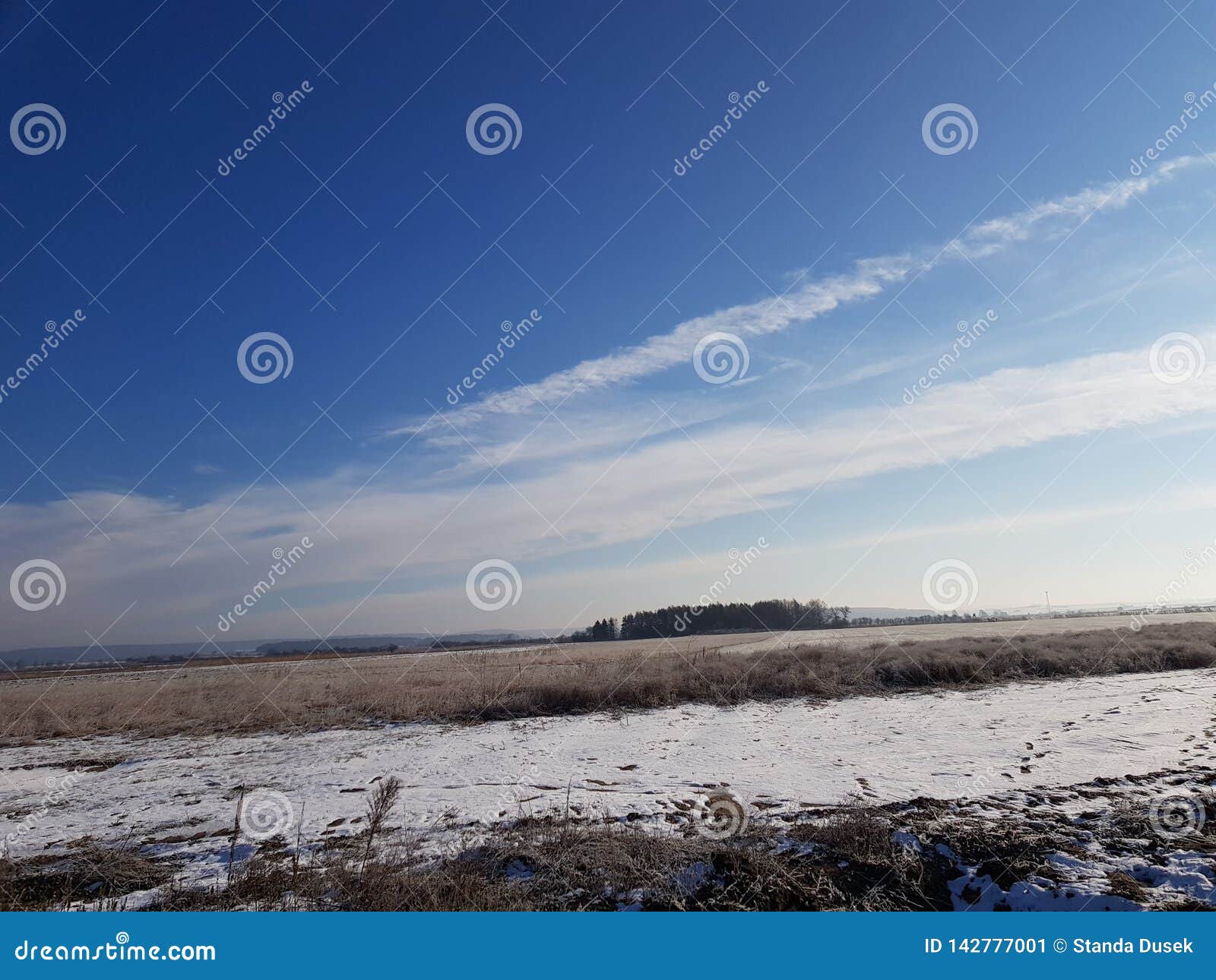 Field sunlit stock image. Image of sunlit, field, clouds - 142777001