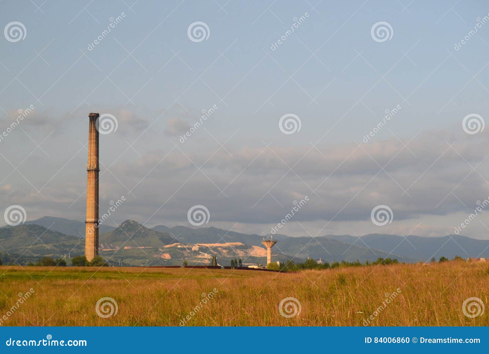 A field and the tower stock photo. Image of landscape - 84006860