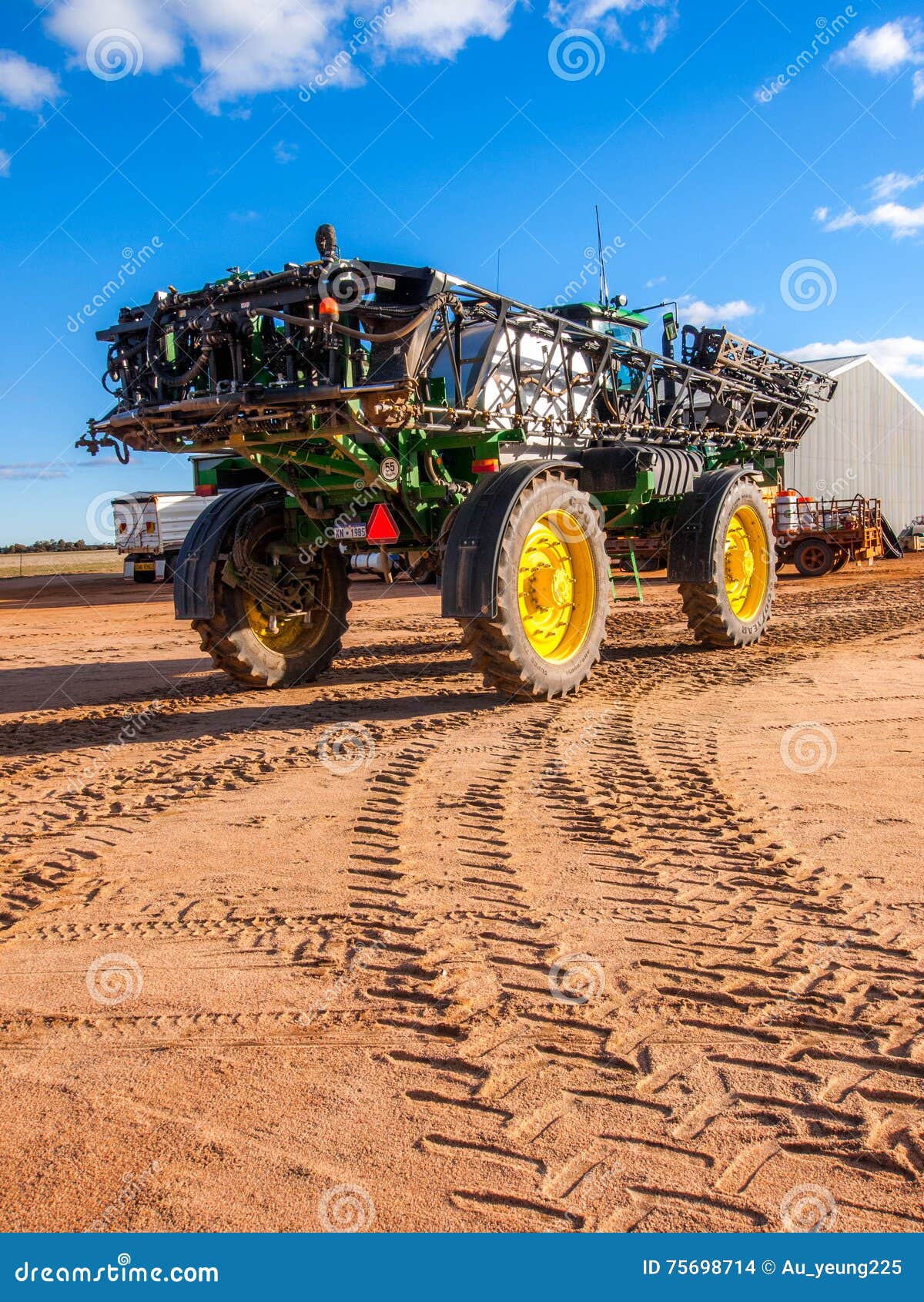 Field tractor sprayer editorial stock image. Image of machinery - 75698714