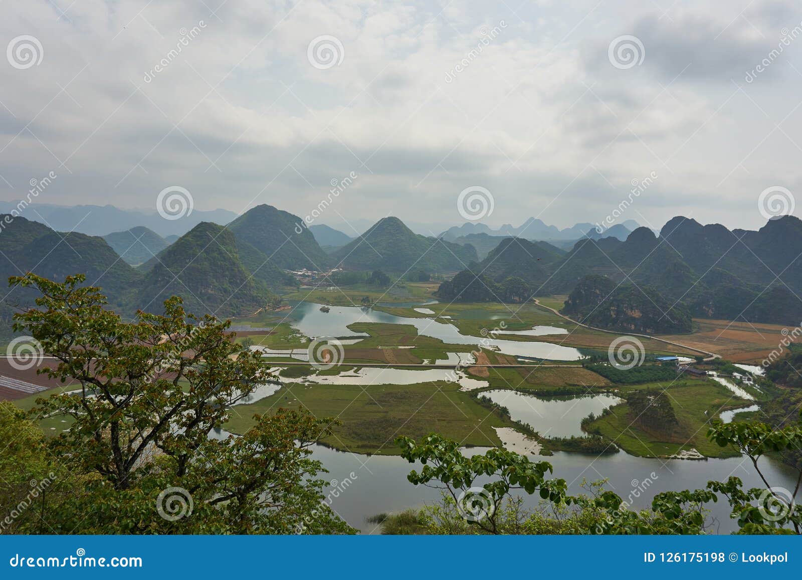 Field and Water between Mountain Range from Viewpoint of Peak Stock ...
