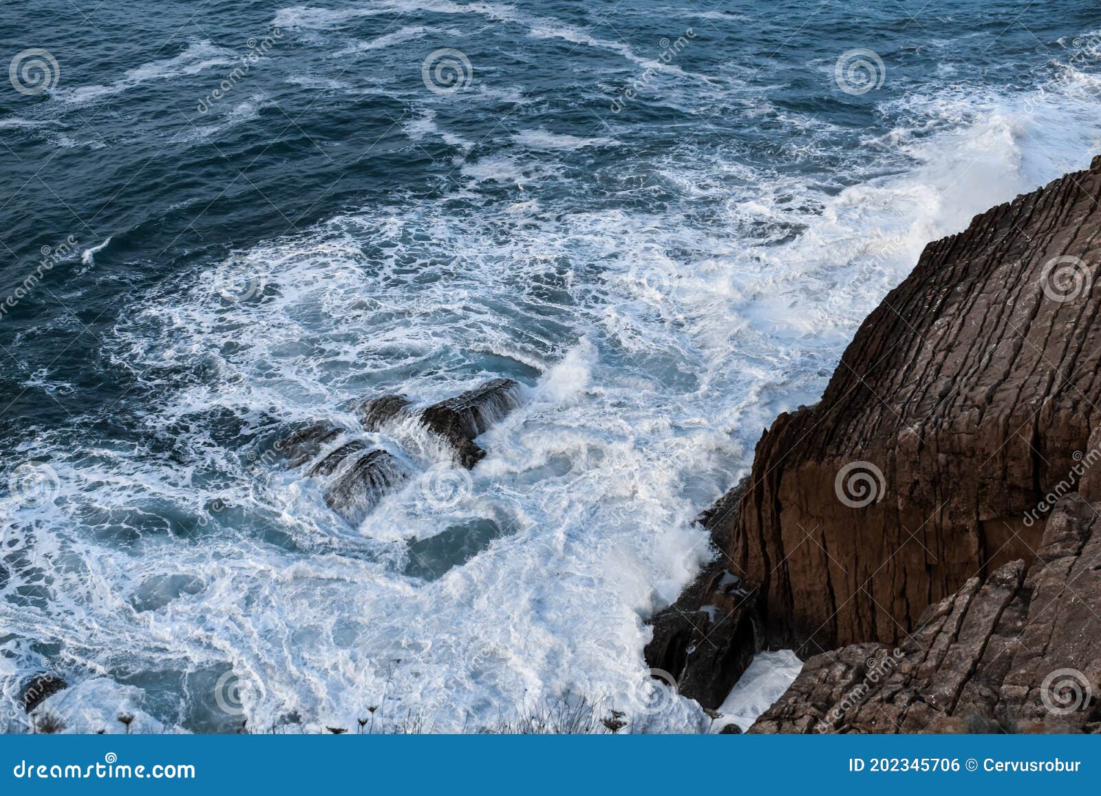 Waves Breaking Against the Rocks Stock Photo - Image of waves, nature ...