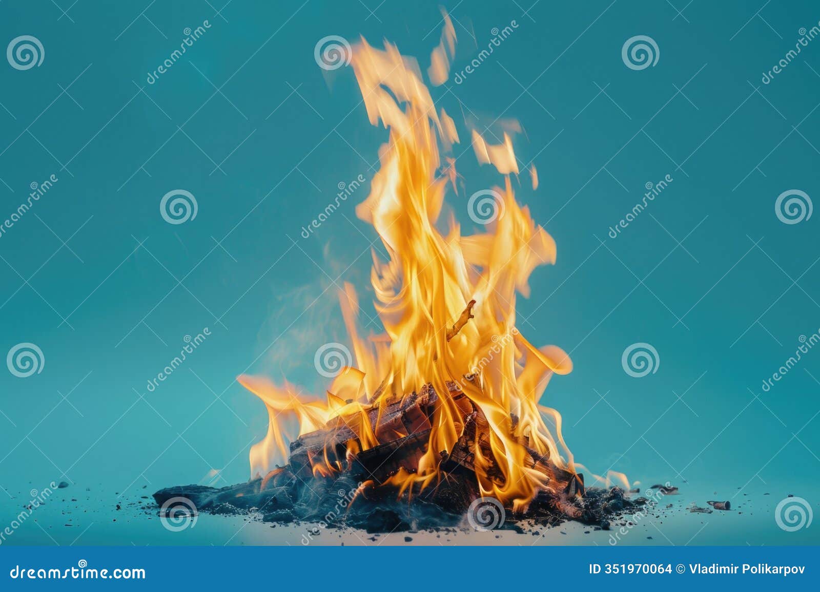 A Fiery Blaze on a Cool Blue Backdrop. Ideal for Backgrounds and ...
