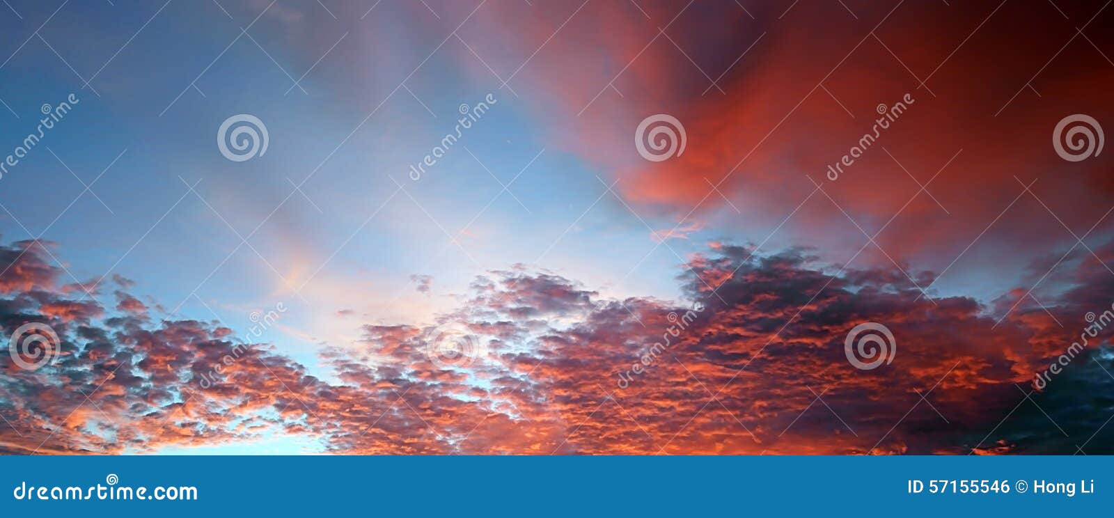 Fiery Clouds in the Blue Sky during a Sunset Stock Photo - Image of ...