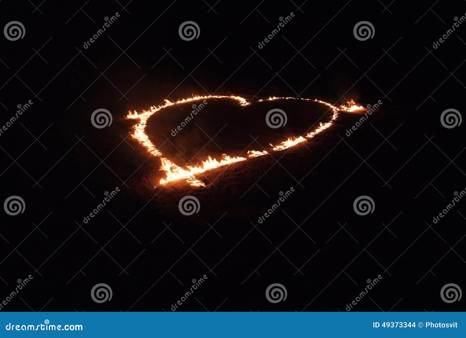 Fiery heart in the sand stock photo. Image of beach, concept - 49373344