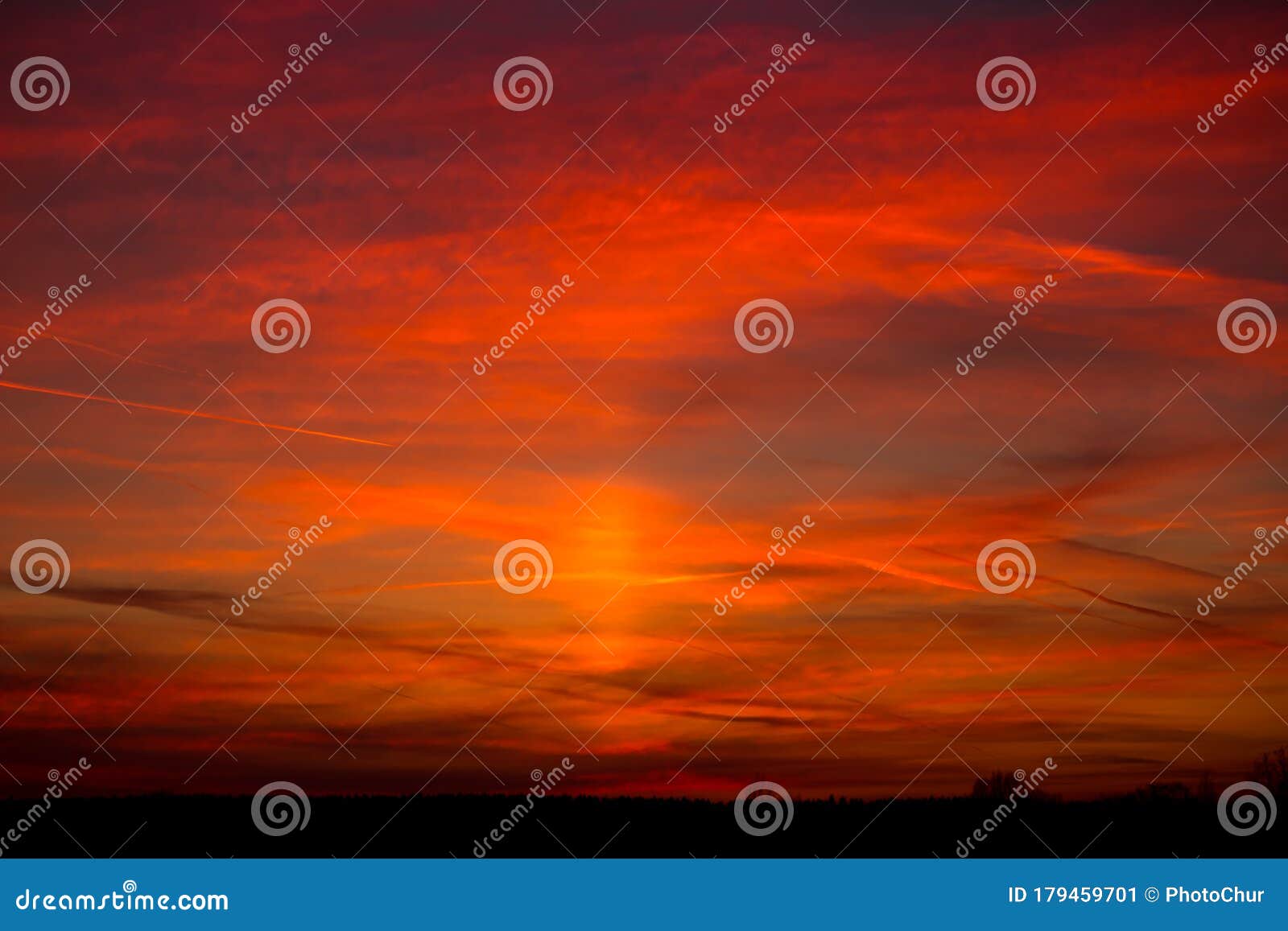 Fiery Red Sunset with the Effect of a Solar Pillar in the Sky Stock ...