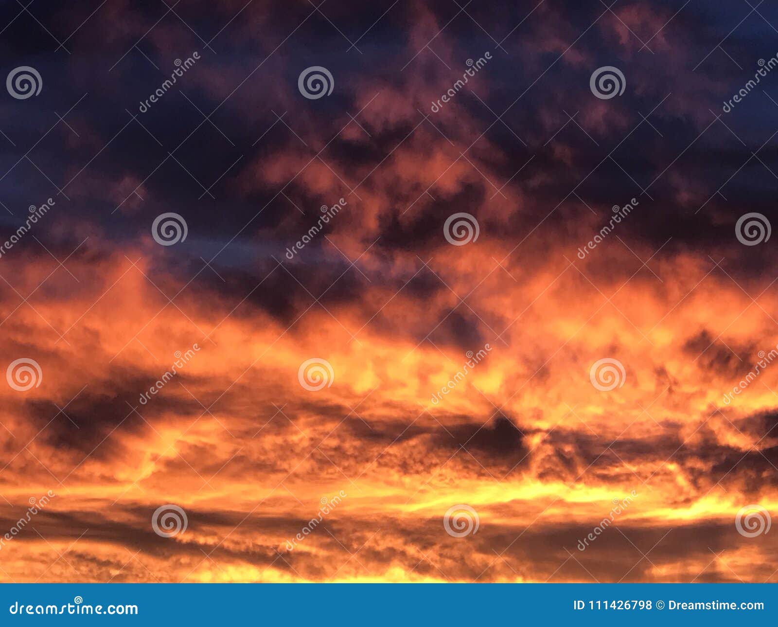 Fiery sky clouds at sunset stock photo. Image of sunset - 111426798