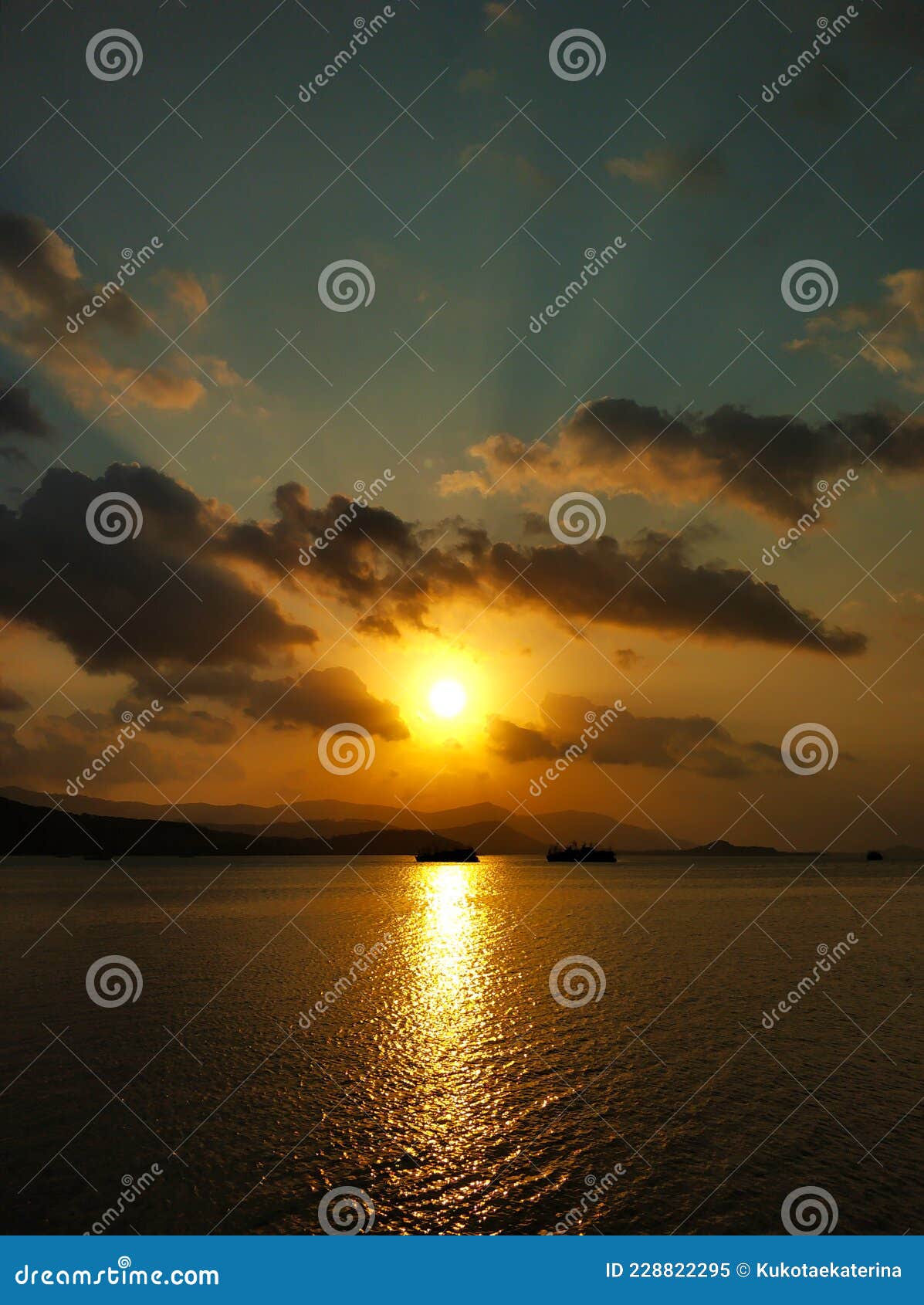 Fiery Sunset with Clouds by the Ocean Stock Image - Image of beautiful ...