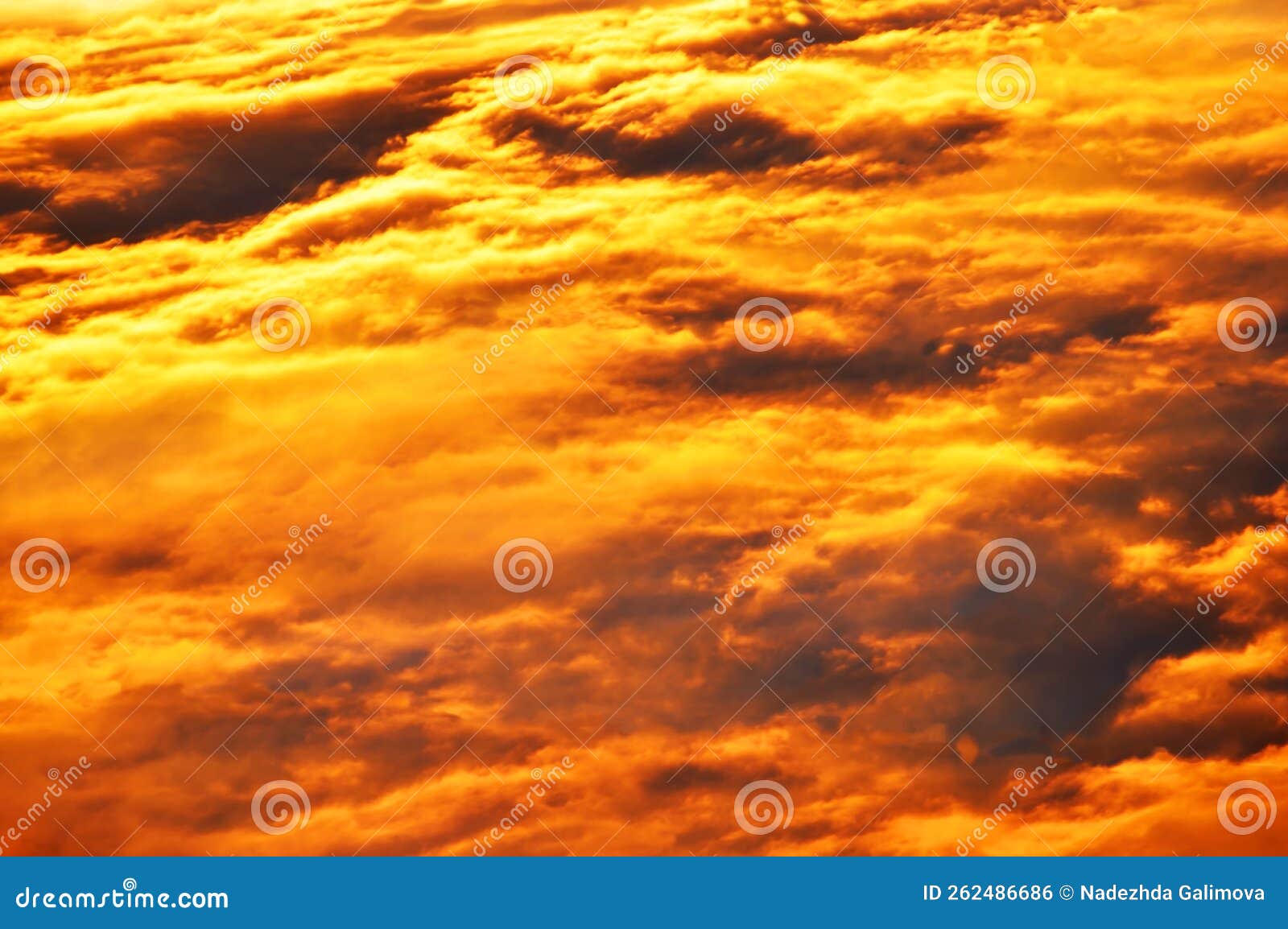 Fiery Sunset. Orange-yellow Clouds in the Summer at Sunset Stock Photo ...