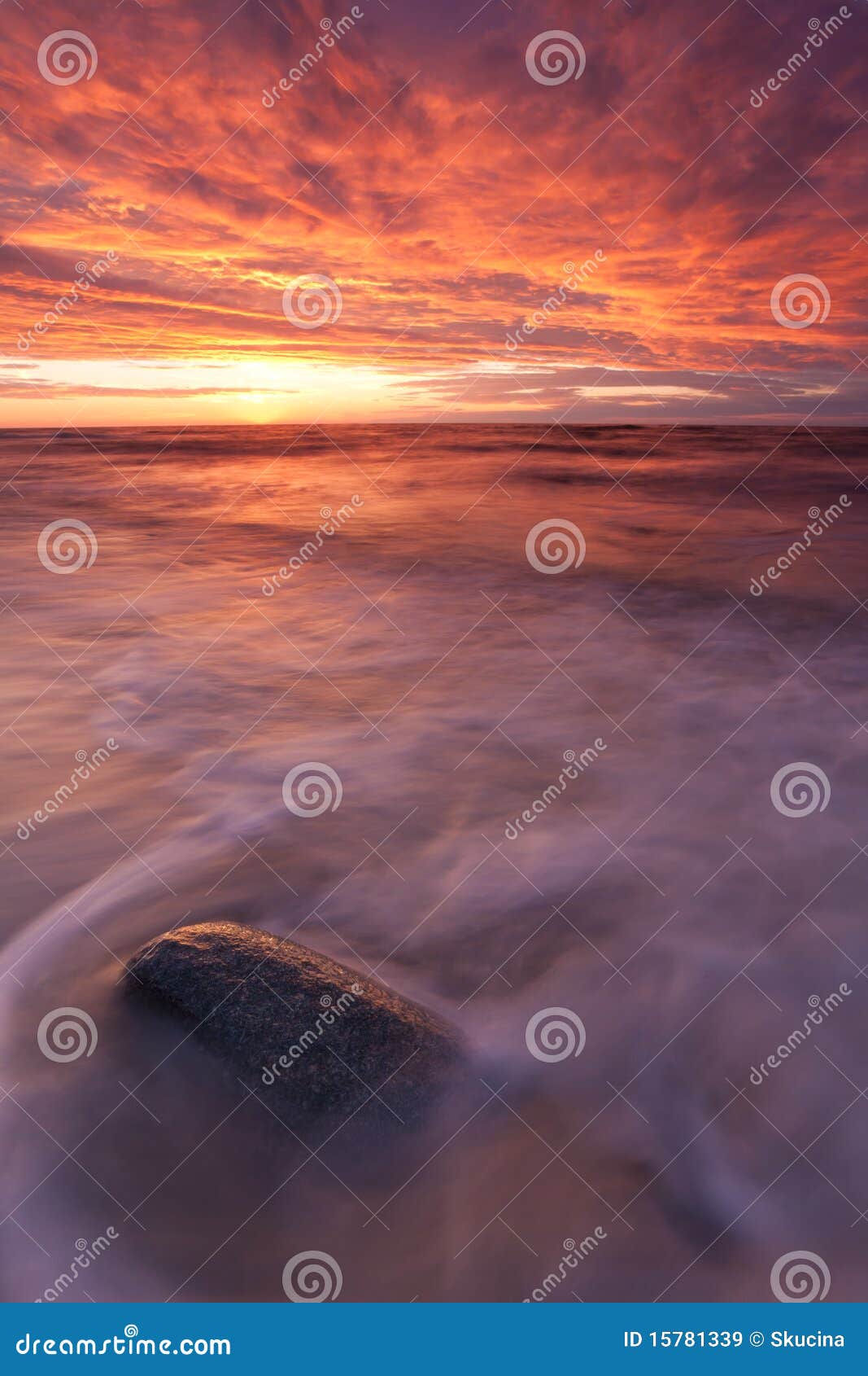 Fiery sunset over sea stock image. Image of sand, sunset - 15781339