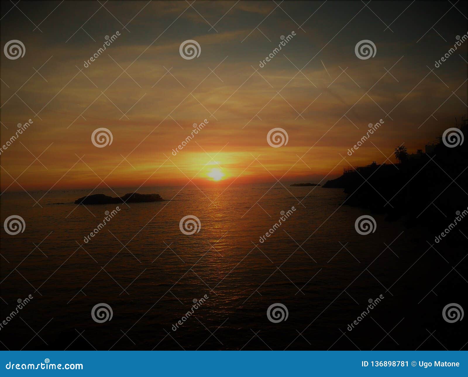 Fiery sunset on the sea stock image. Image of beach - 136898781