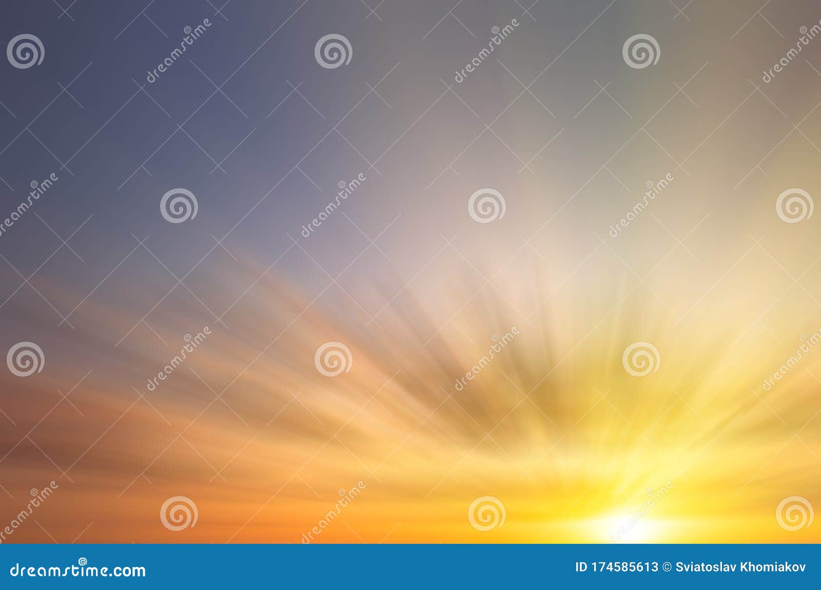 The Fiery Sunset Sun and the Rays through the Clouds Against the Blue ...