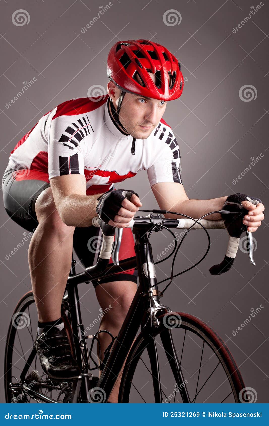 Fietser op een fiets stock afbeelding. Image of professioneel - 25321269