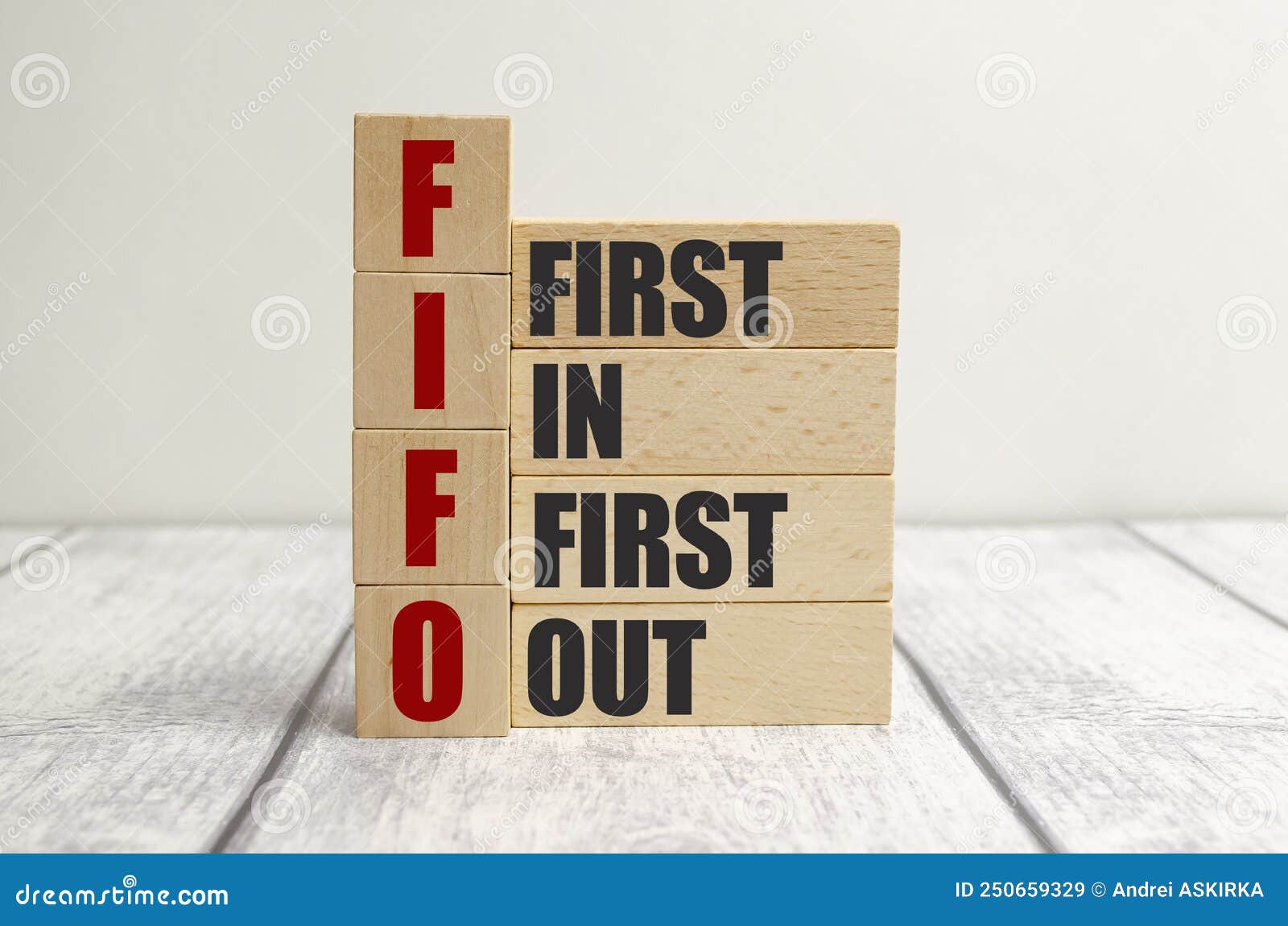 FIFO First in, First Out Word on Wooden Cubes on Wooden Background ...