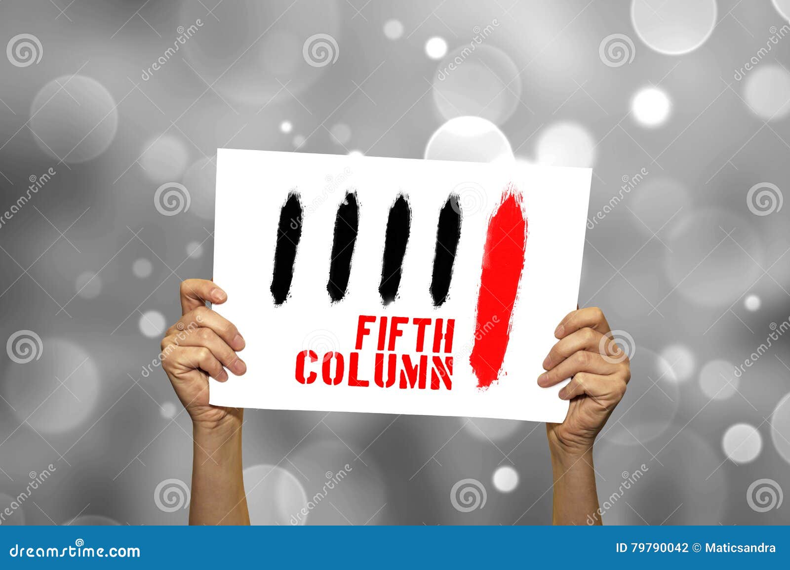 FIFTH COLUMN Card in Hand with Abstract Light Background. Stock Photo ...