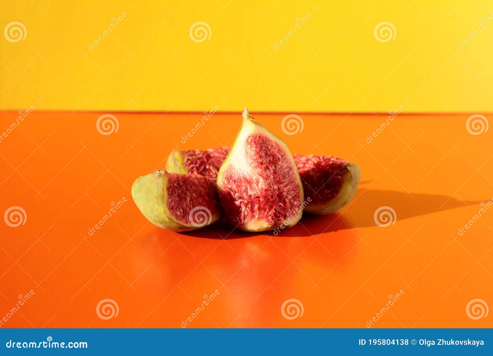 Fig Slices on an Orange Background. Figs on a Bright Background Stock ...
