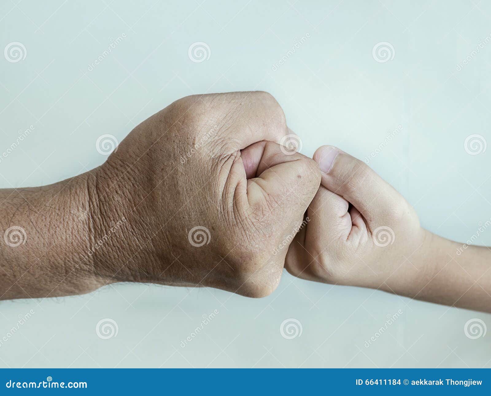 Fight, Close Up of Two Fists Hitting of a Man and a Boy. Stock Photo ...