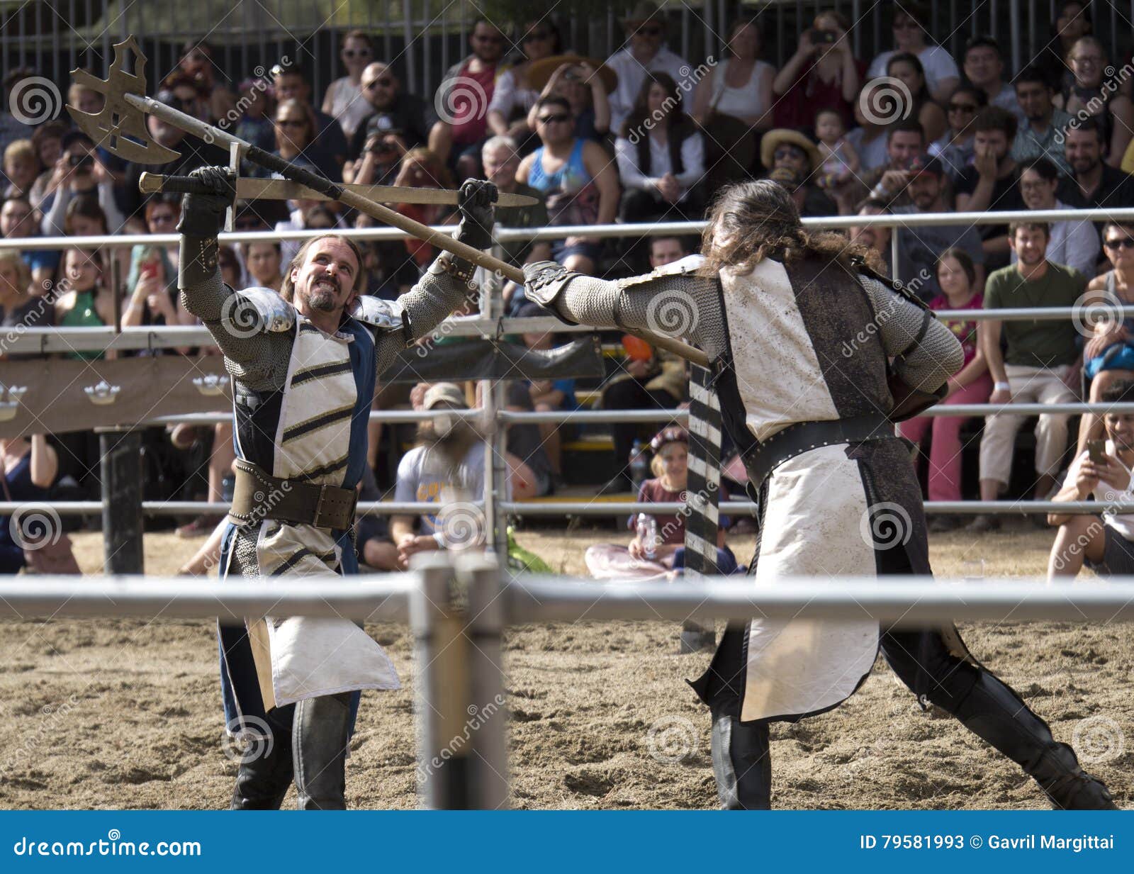 Fight between two knights editorial stock photo. Image of costumes ...