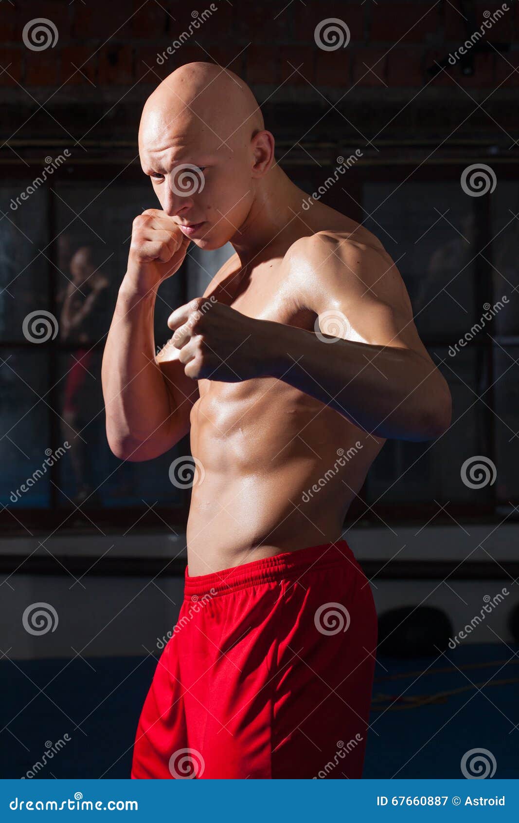 Fighter in fighting stance stock image. Image of muscle - 67660887