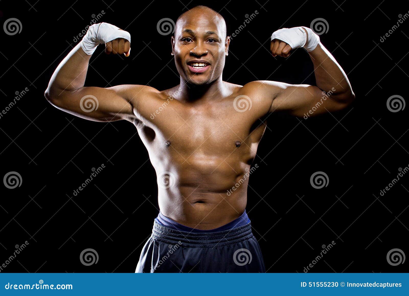 Fighter Flexing Muscles stock photo. Image of abdominal - 51555230