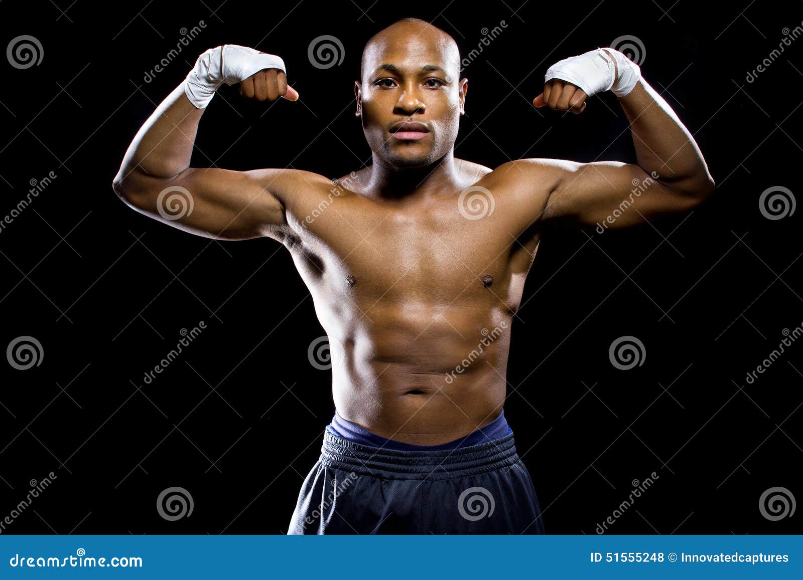 Fighter Flexing Muscles stock photo. Image of fitness - 51555248
