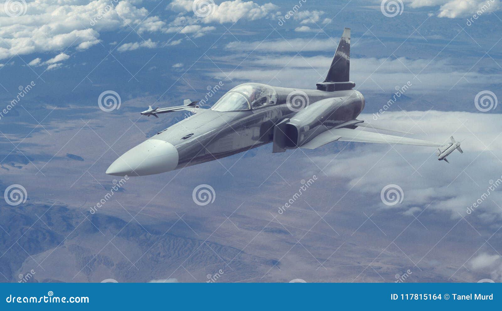 A Fighter Jet Flying at a High Altitude Over a Desert Terrain and ...