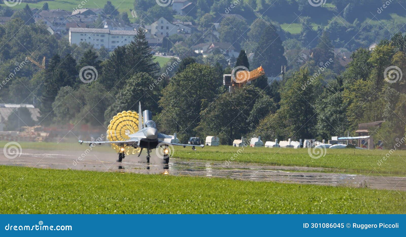 Fighter Jet Landing with Brake Parachute in Mountain Air Base. Copy ...