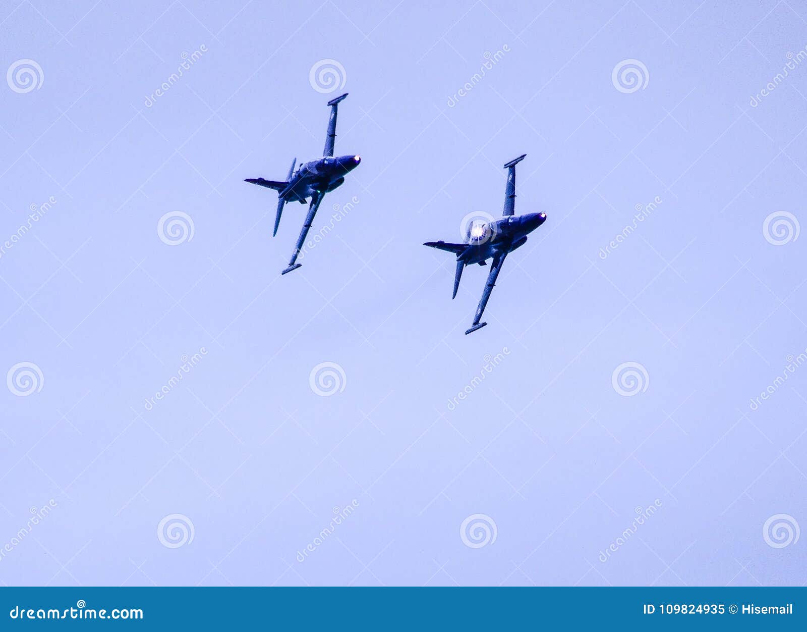 Fighter Jets Flying Sideways Next To Each Other with One Flashing a ...