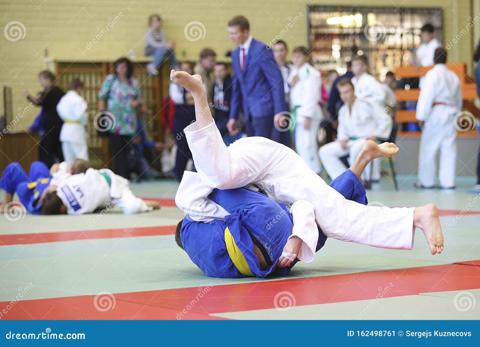 Fighter Judo in Competition Editorial Photo - Image of tatami, white ...
