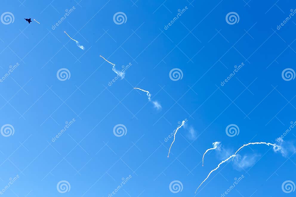 Fighter Plane Releasing Decoy Stock Photo - Image of glory, background ...