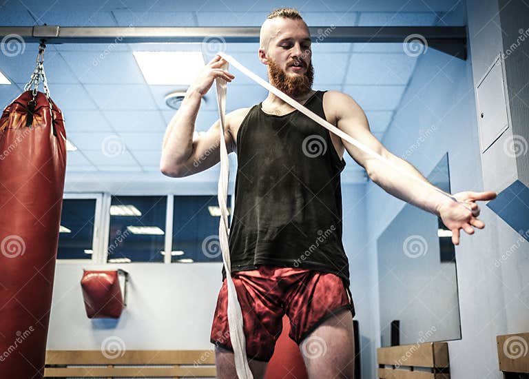 Fighter Preparing for Training, Wrapping Hands with Boxing Wraps Stock ...