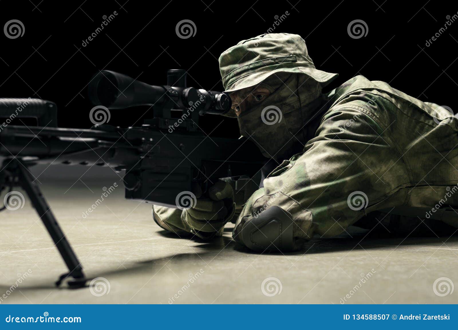 Fighter of a Special Unit is Aiming at the Sight of the Machine Gun ...