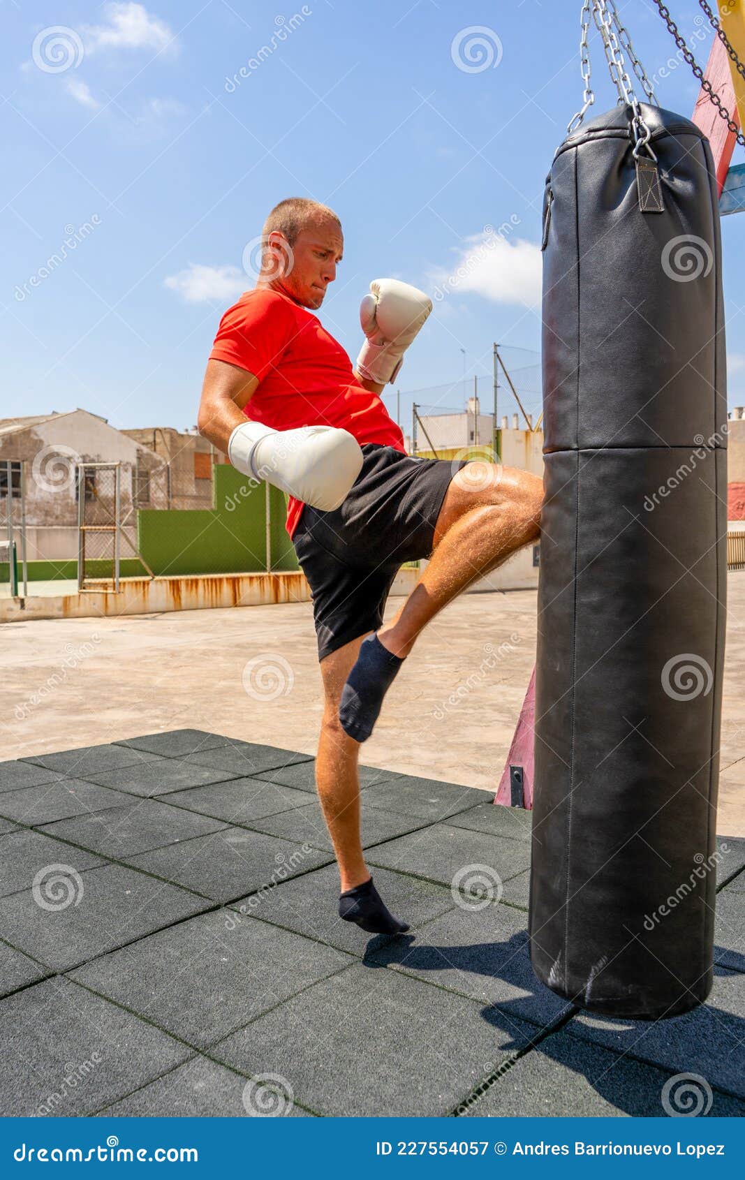 Fighter in Training Moment with a Punching Bag. Training Concept Stock ...
