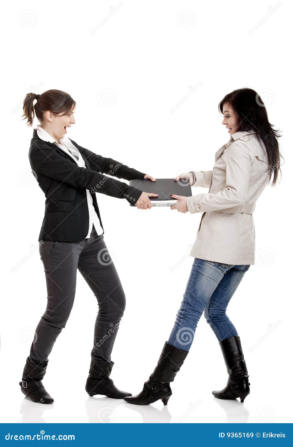 Fighting for a laptop stock image. Image of female, cheerful - 9365169