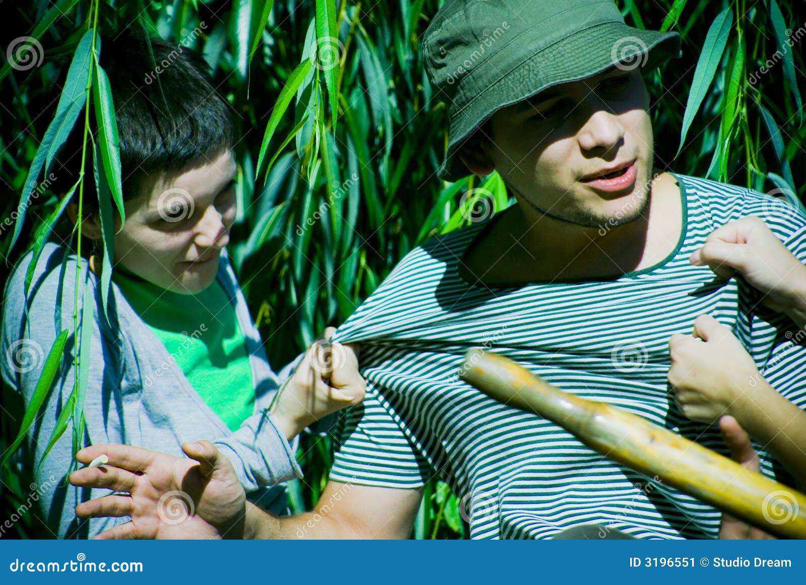 Fighting over a man stock image. Image of assaulting, striped - 3196551