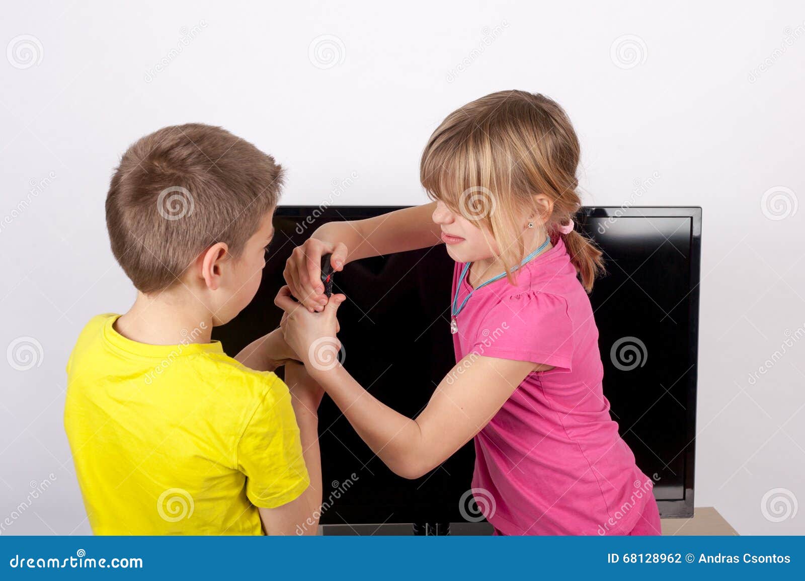 Fighting for the Remote Control Stock Photo - Image of fight, caucasian ...