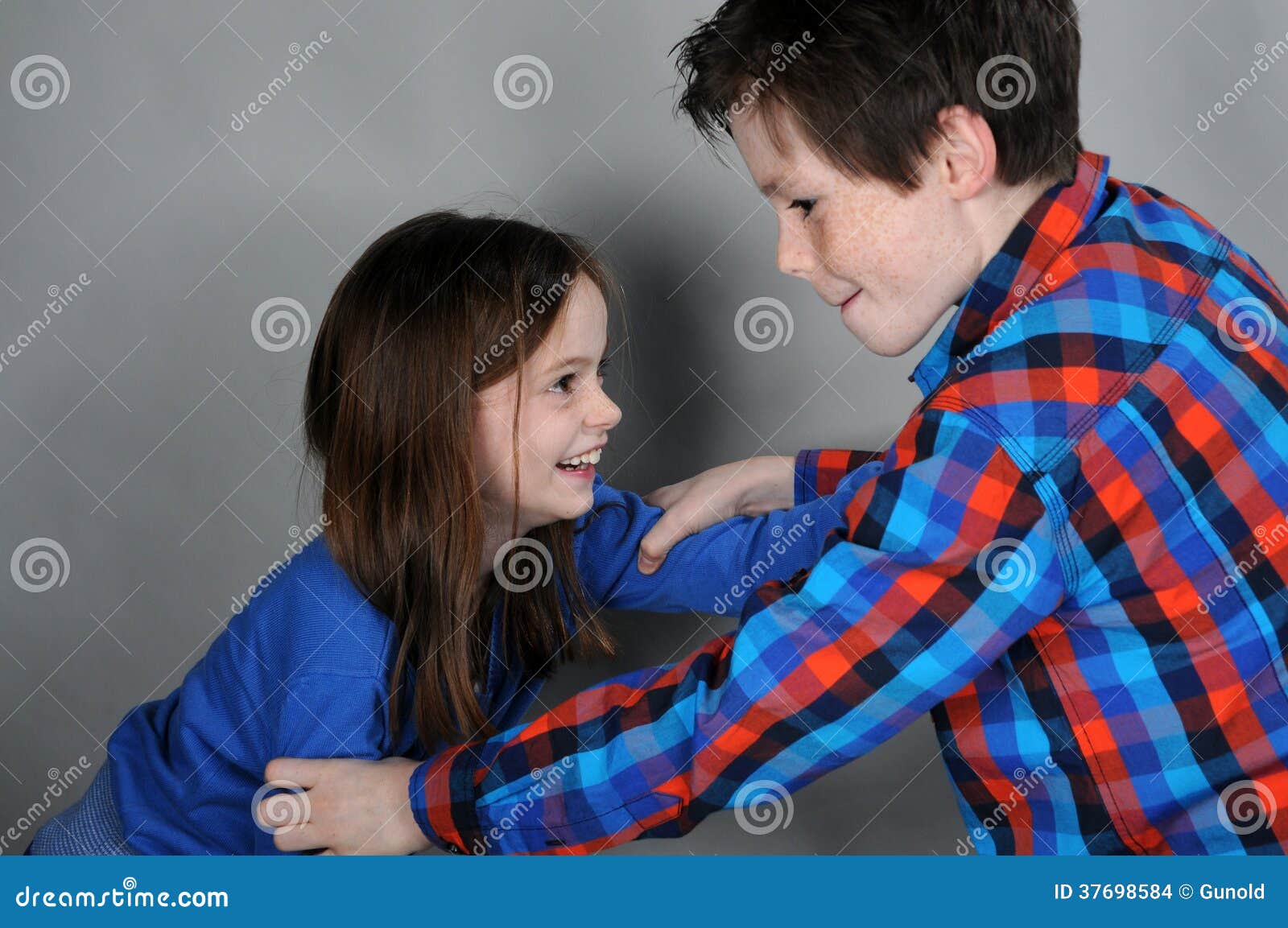 Fighting siblings stock photo. Image of screaming, pulling - 37698584