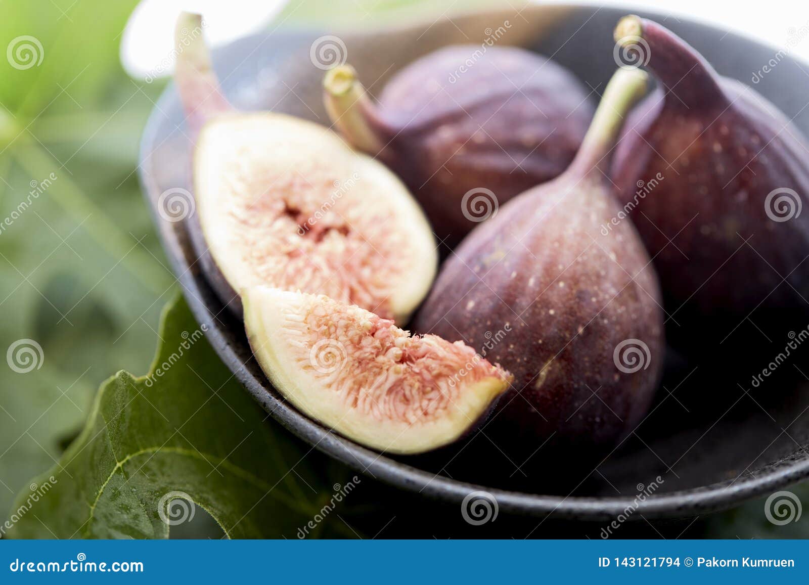 Figs in a a Bowl with Fig Leaf Stock Photo - Image of tropical, table ...