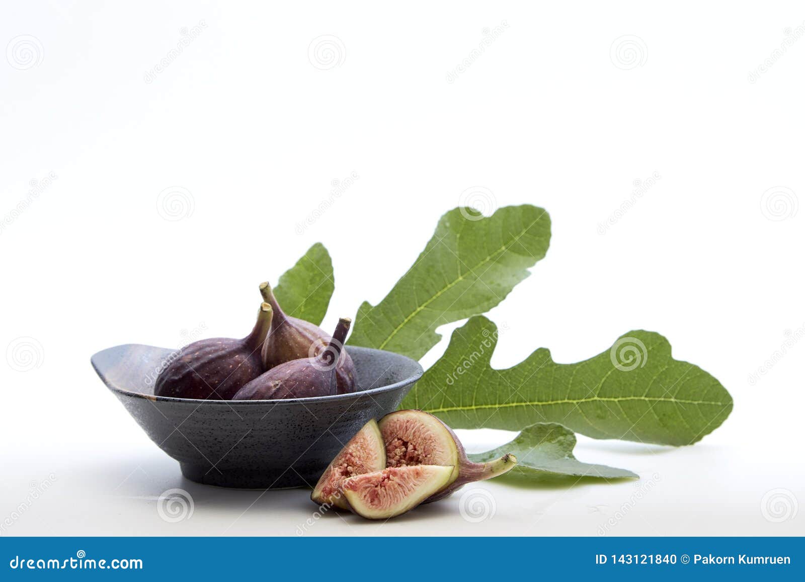 Figs in a a Bowl with Fig Leaf Stock Photo - Image of wood, table ...