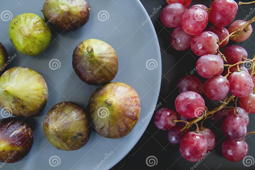 Figs and red grapes stock photo. Image of fleshy, mediterranean - 171802666
