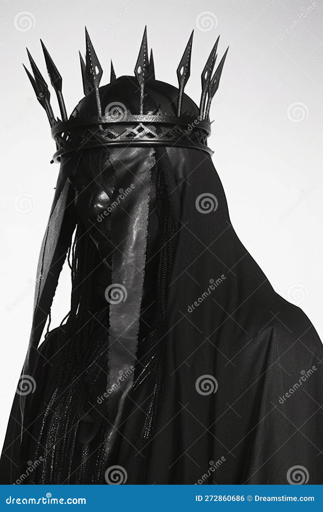 A Figure in a Black Robe with a Crown with Sharp Spikes, the Concept of ...