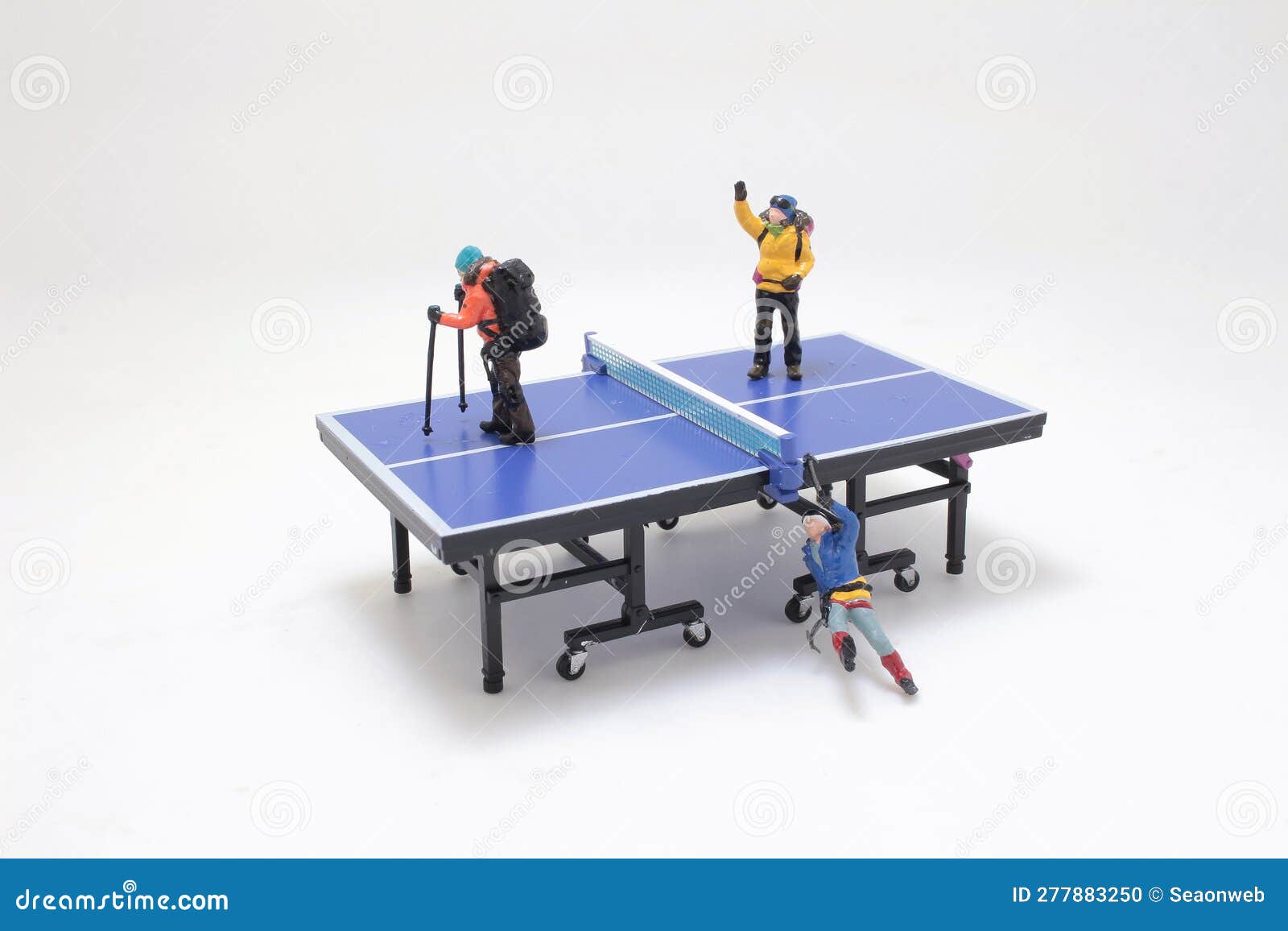 A Figure Climb Table on the Ping Pong Table Stock Photo - Image of ...
