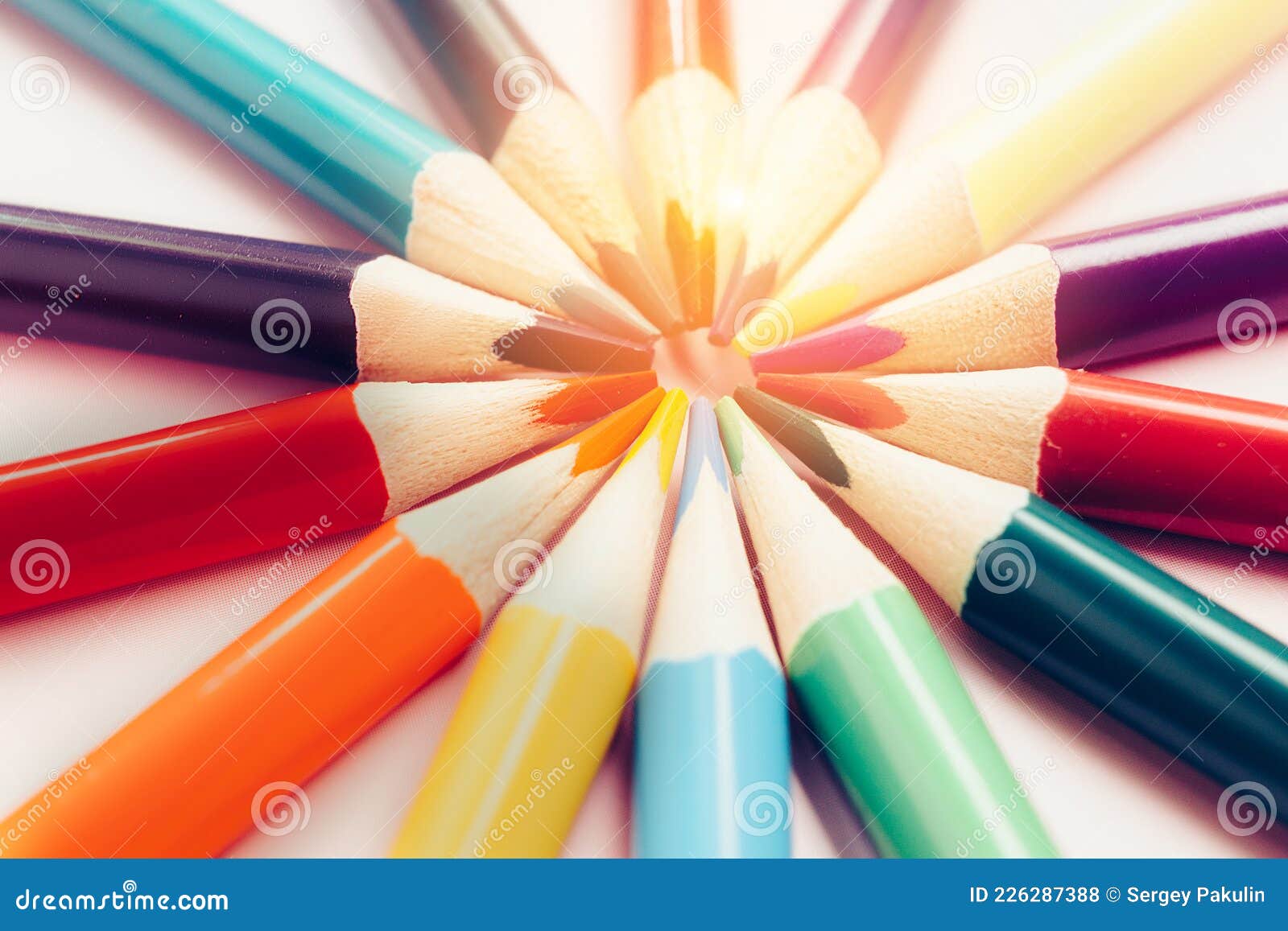 A Figure of Colored Pencils in the Shape of the Sun with Rays. the ...