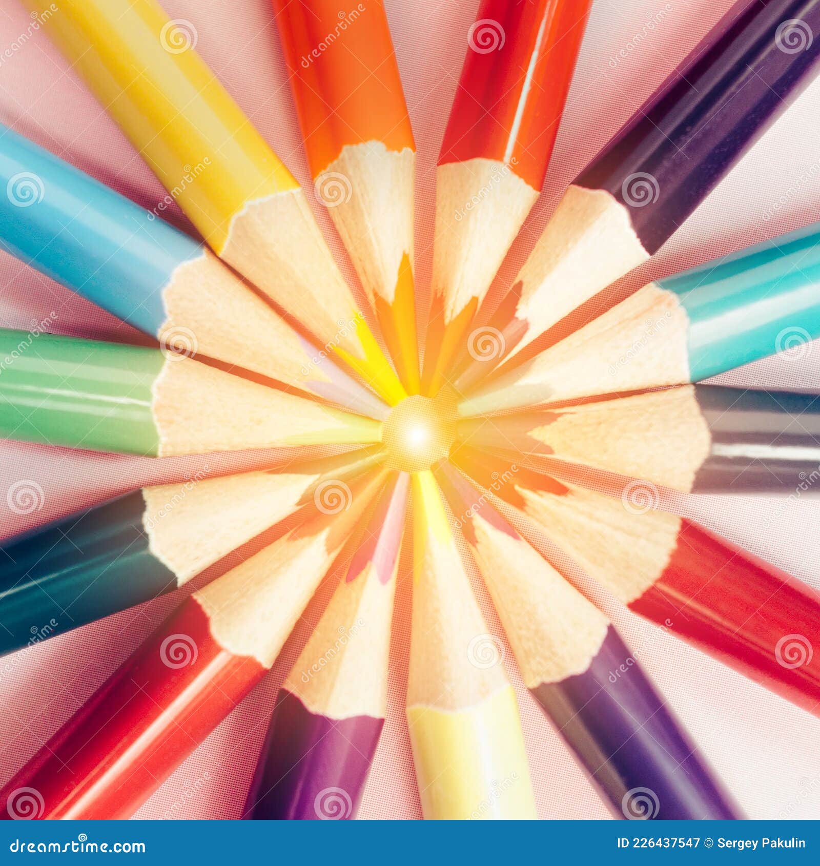 A Figure of Colored Pencils in the Shape of the Sun with Rays. the ...