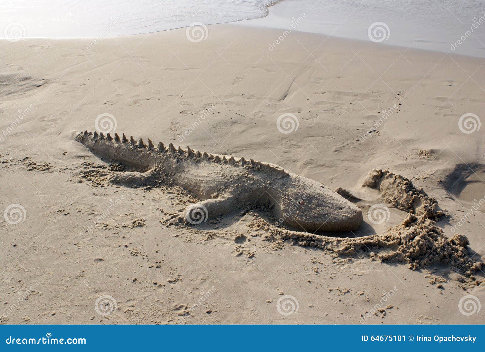 Figure Crocodile from sand stock image. Image of entertainment - 64675101