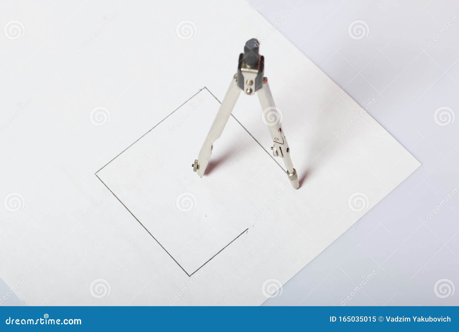 A Figure Drawn by a Compass on White Paper. Drawn Square, Compass in ...