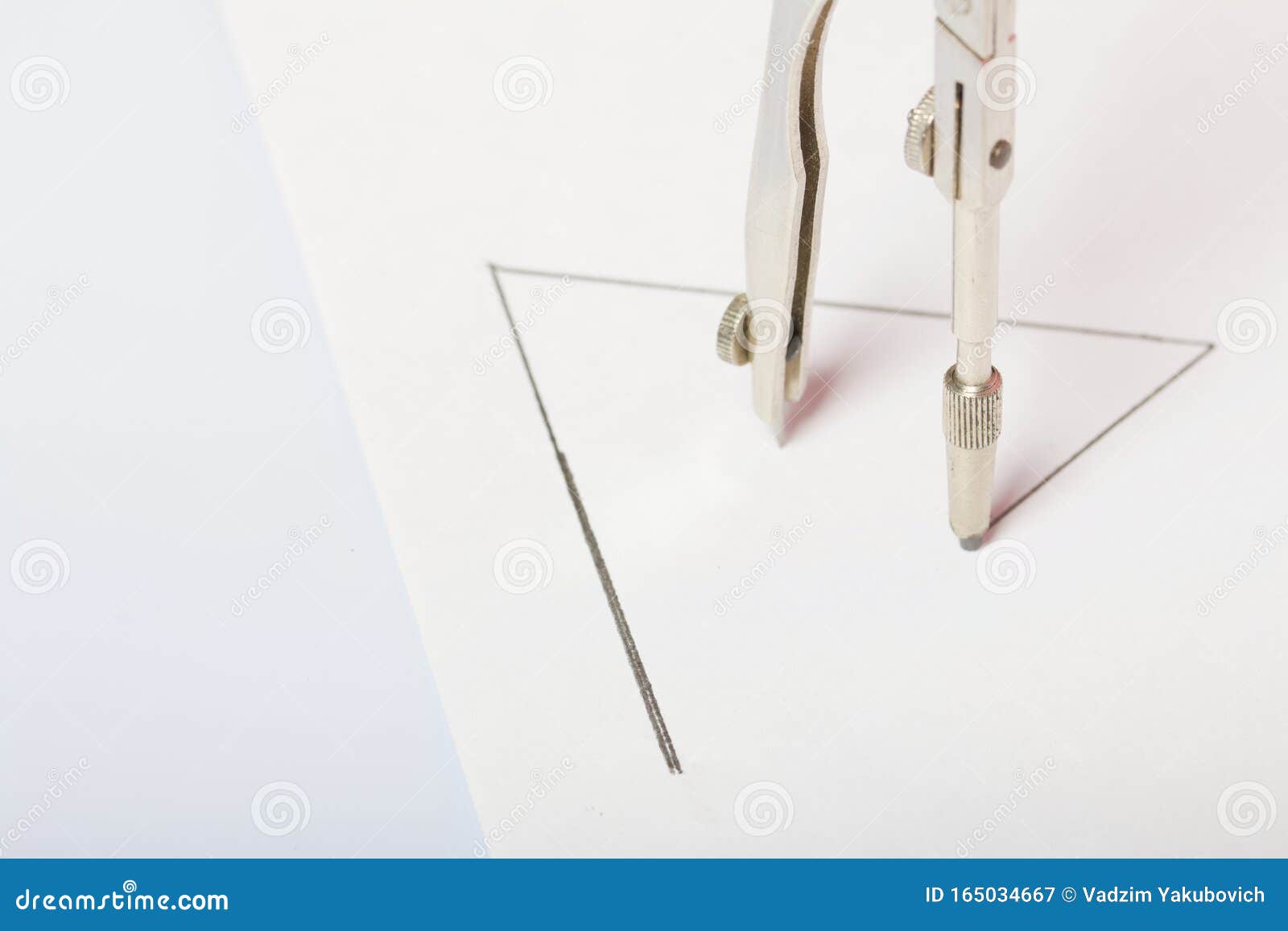 A Figure Drawn by a Compass on White Paper. Triangle, Compass in Space ...