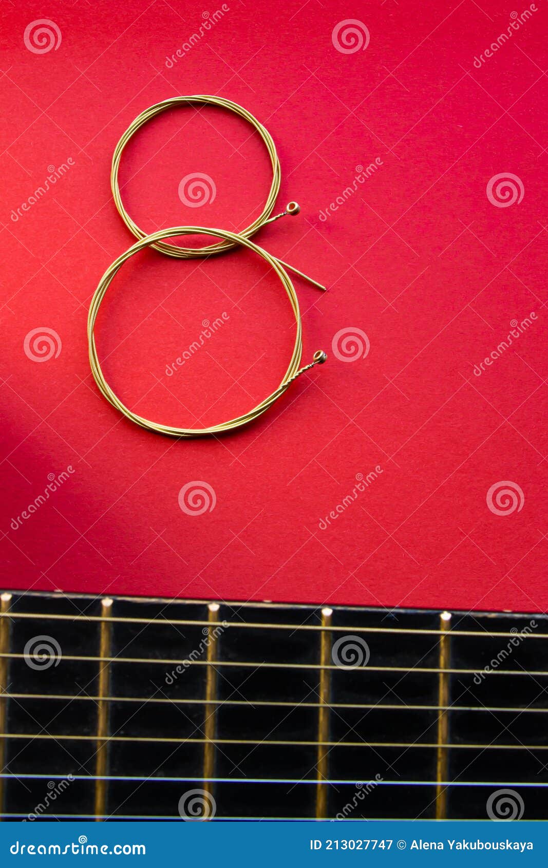 Figure Eight of Guitar Strings on a Red Background. Guitar Neck Stock ...