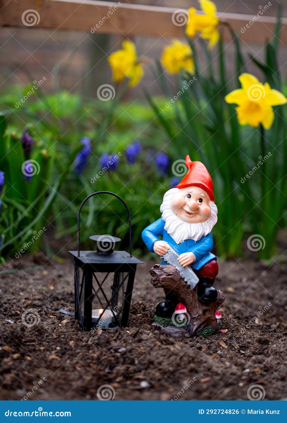 Figure of a Gnome Working in the Garden Stock Photo - Image of object ...