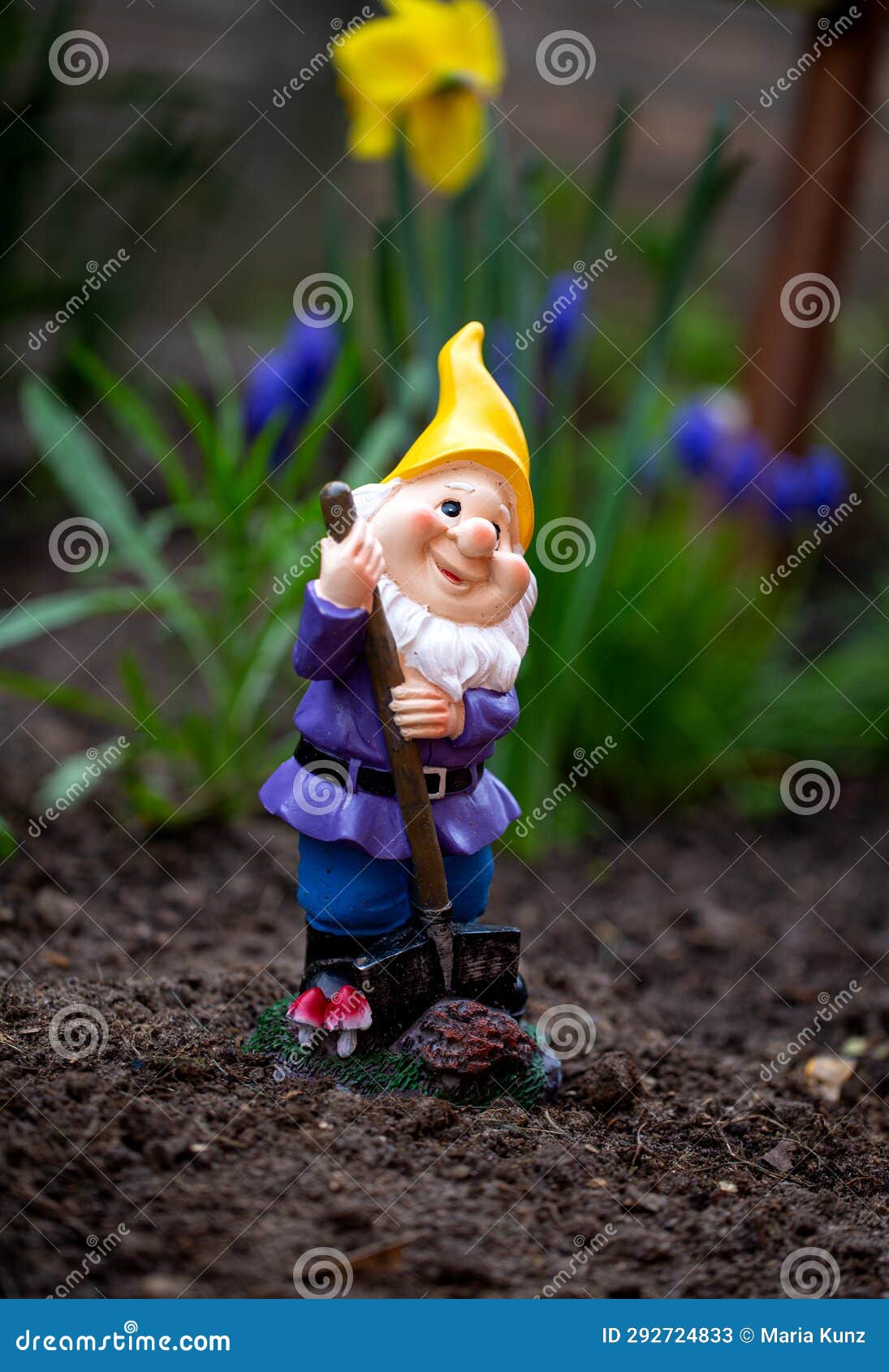 Figure of a Gnome Working in the Garden Stock Image - Image of ...